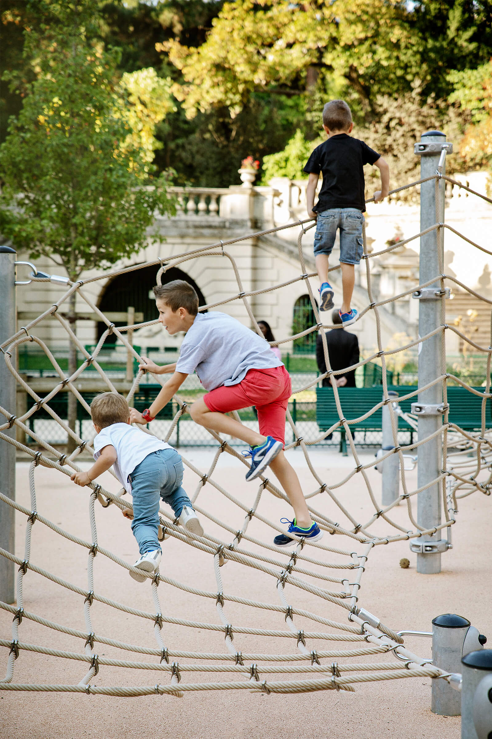 Multicultural Kids Playing On Playground