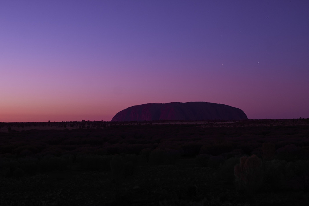 What is a sacred Aboriginal site, and how can visitors be respectful there?