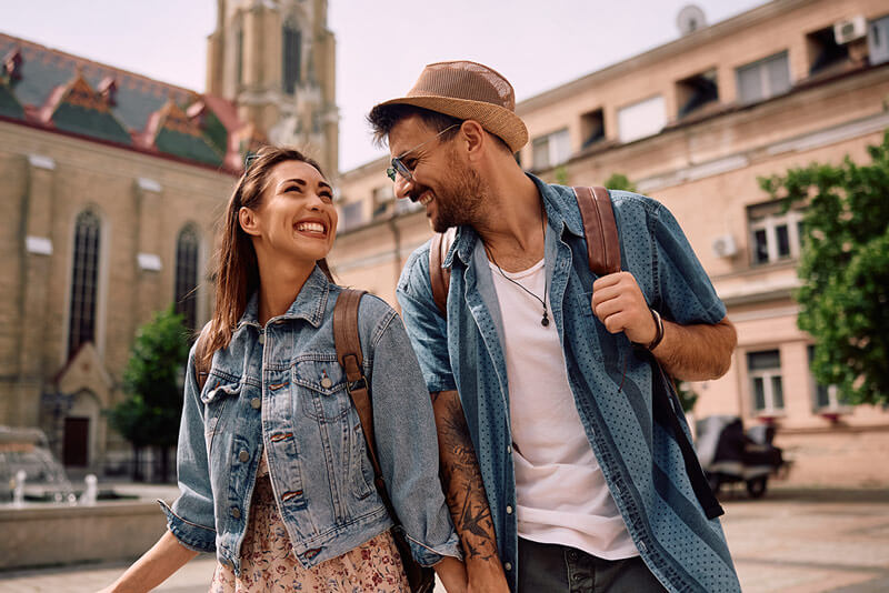 A happy couple holding hands