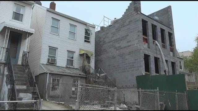 Fire officials: 2 construction workers fall from scaffolding, wall ...