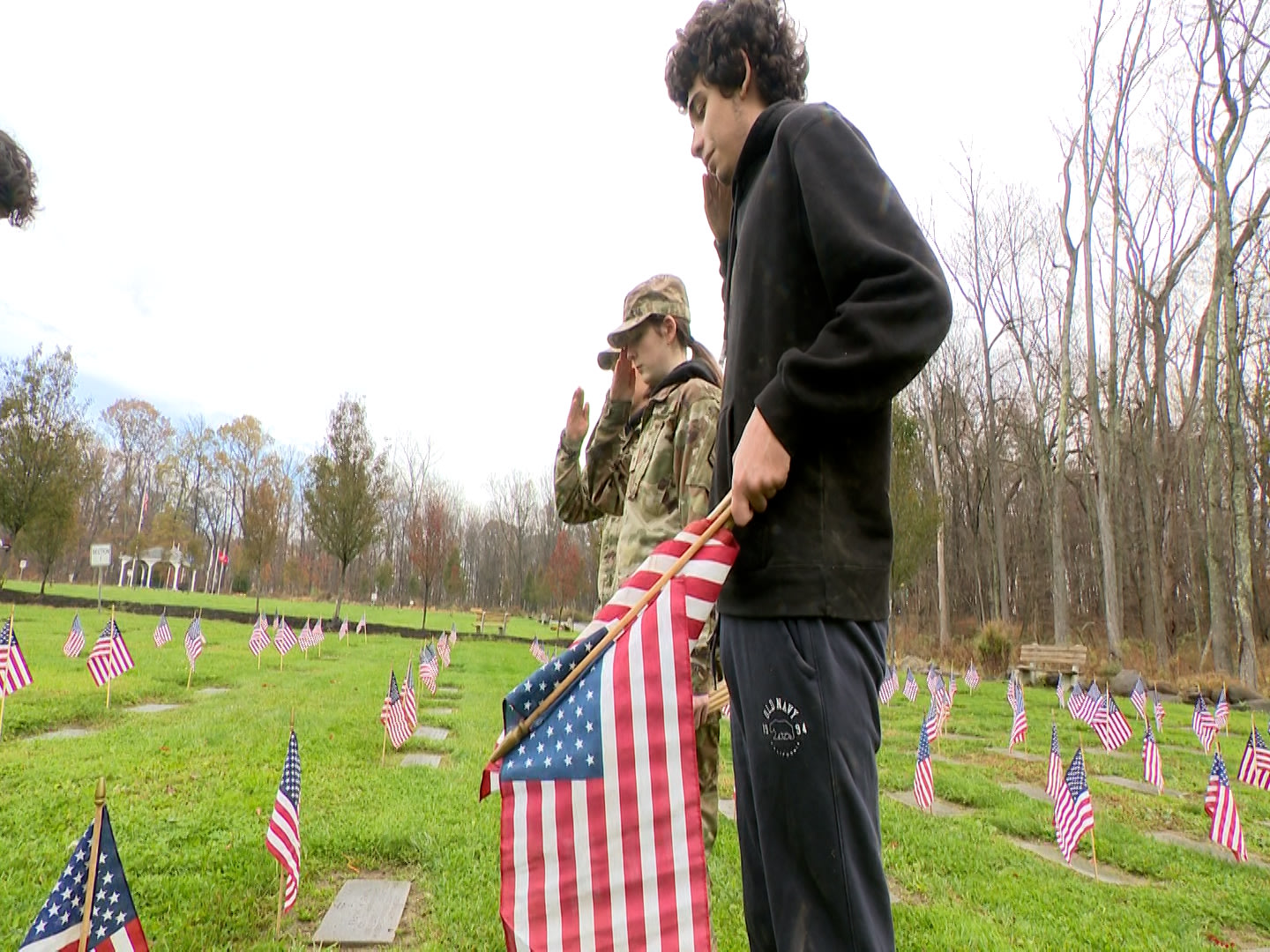 Teens help place 4,000 flags on graves of veterans in Orange County
