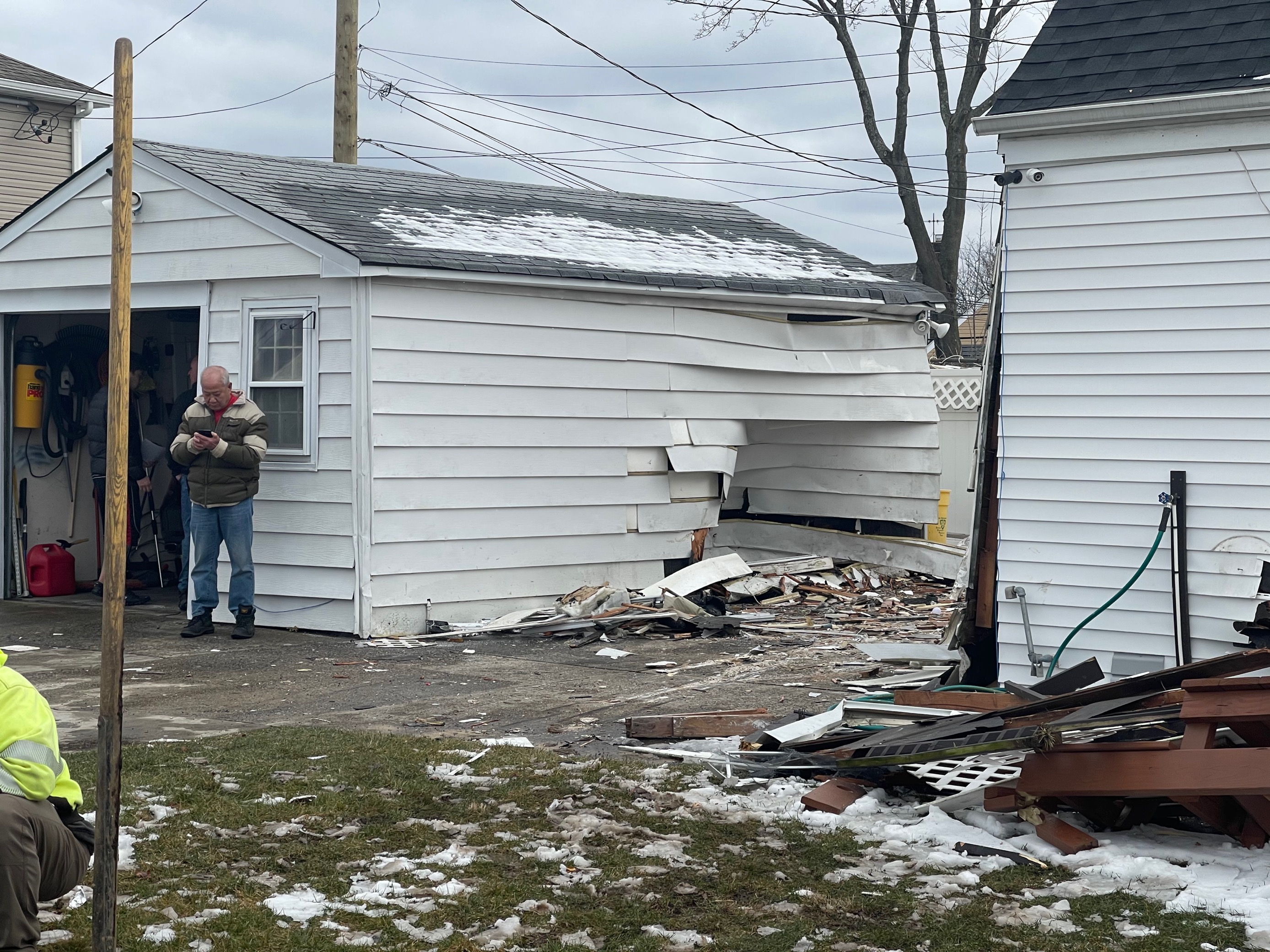 Police: Car slams into Hicksville home, causing major damage