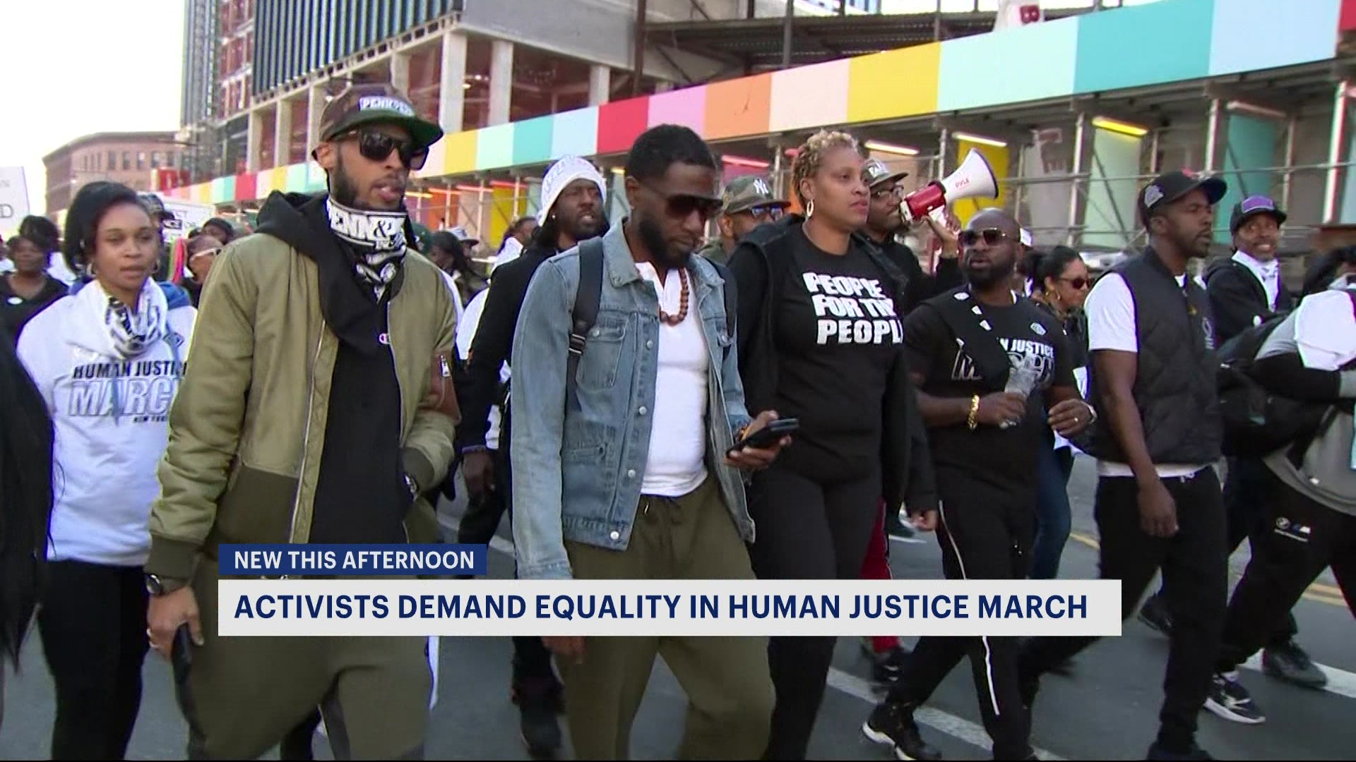 Hundreds rally for human justice during walk from Brooklyn to Long ...