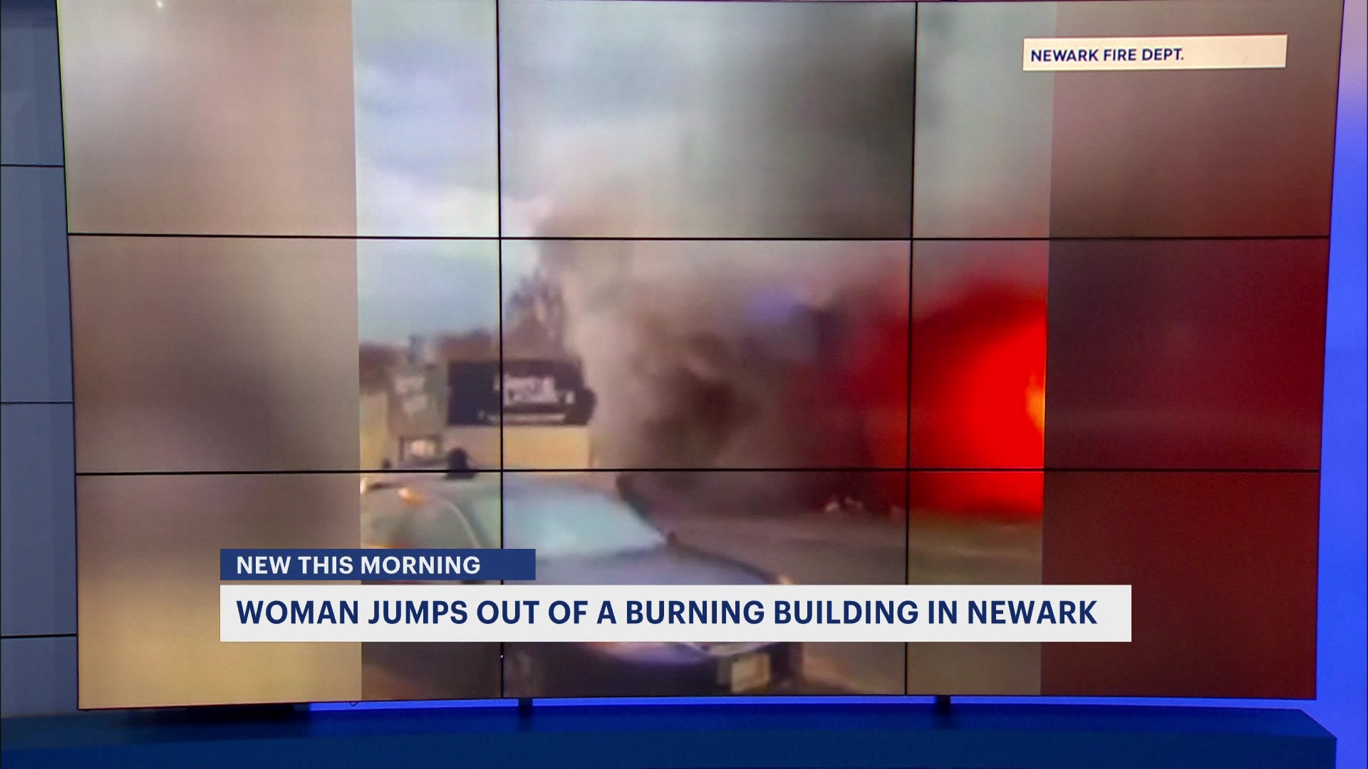 Authorities: Woman injured after jumping out of burning building in Newark