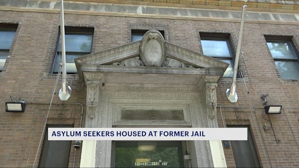 Dozens of asylum seekers call former Harlem jail new temporary home