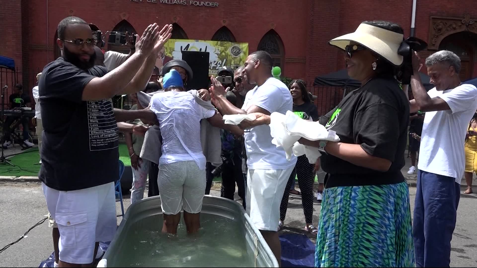 Church holds ‘stoop’ baptisms, block party in Bed-Stuy