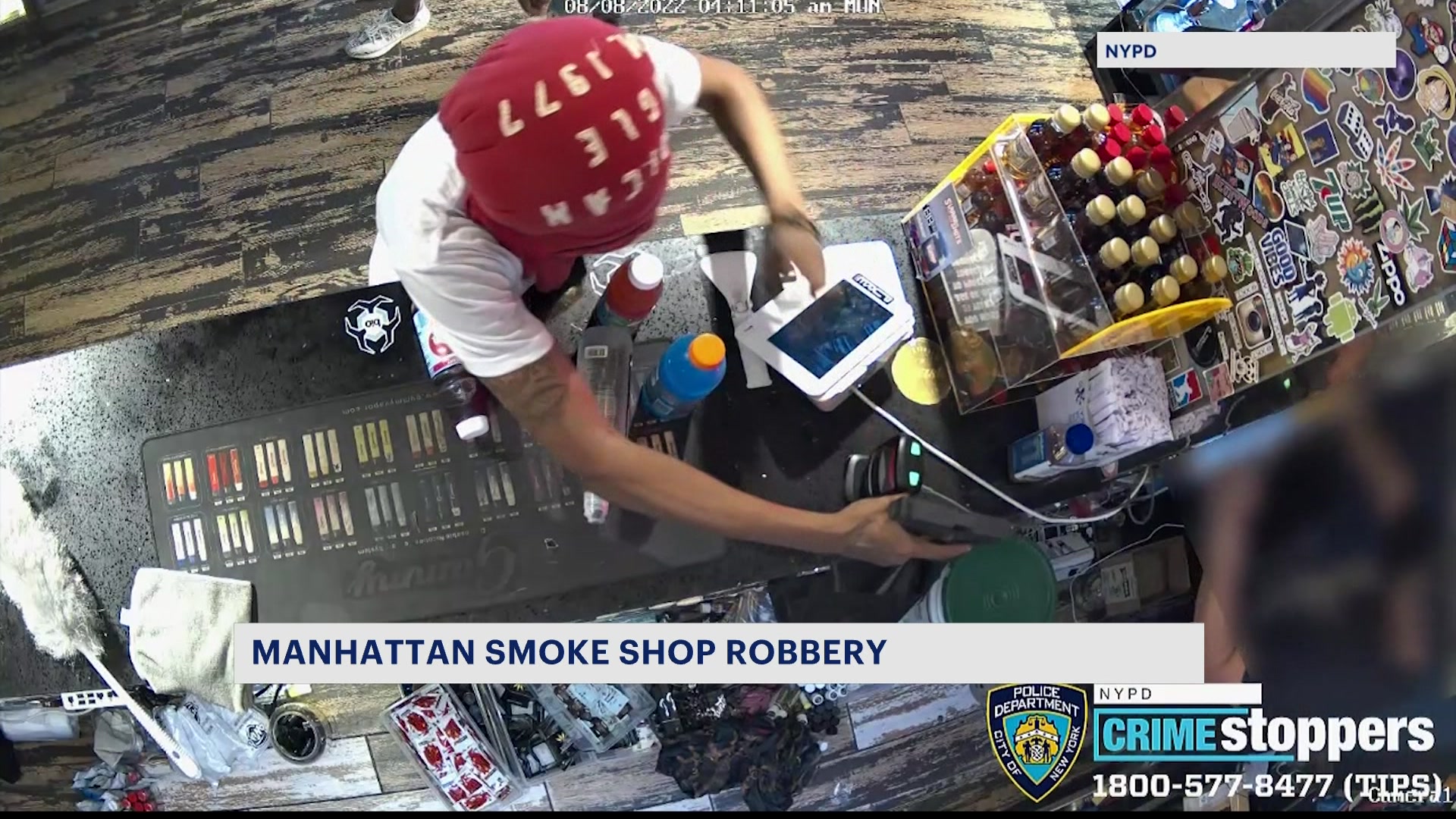 Police: Gunpoint smoke shop robbery caught on camera