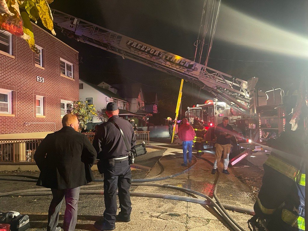 Firefighter trapped in burning building in Freeport, uses axe to escape