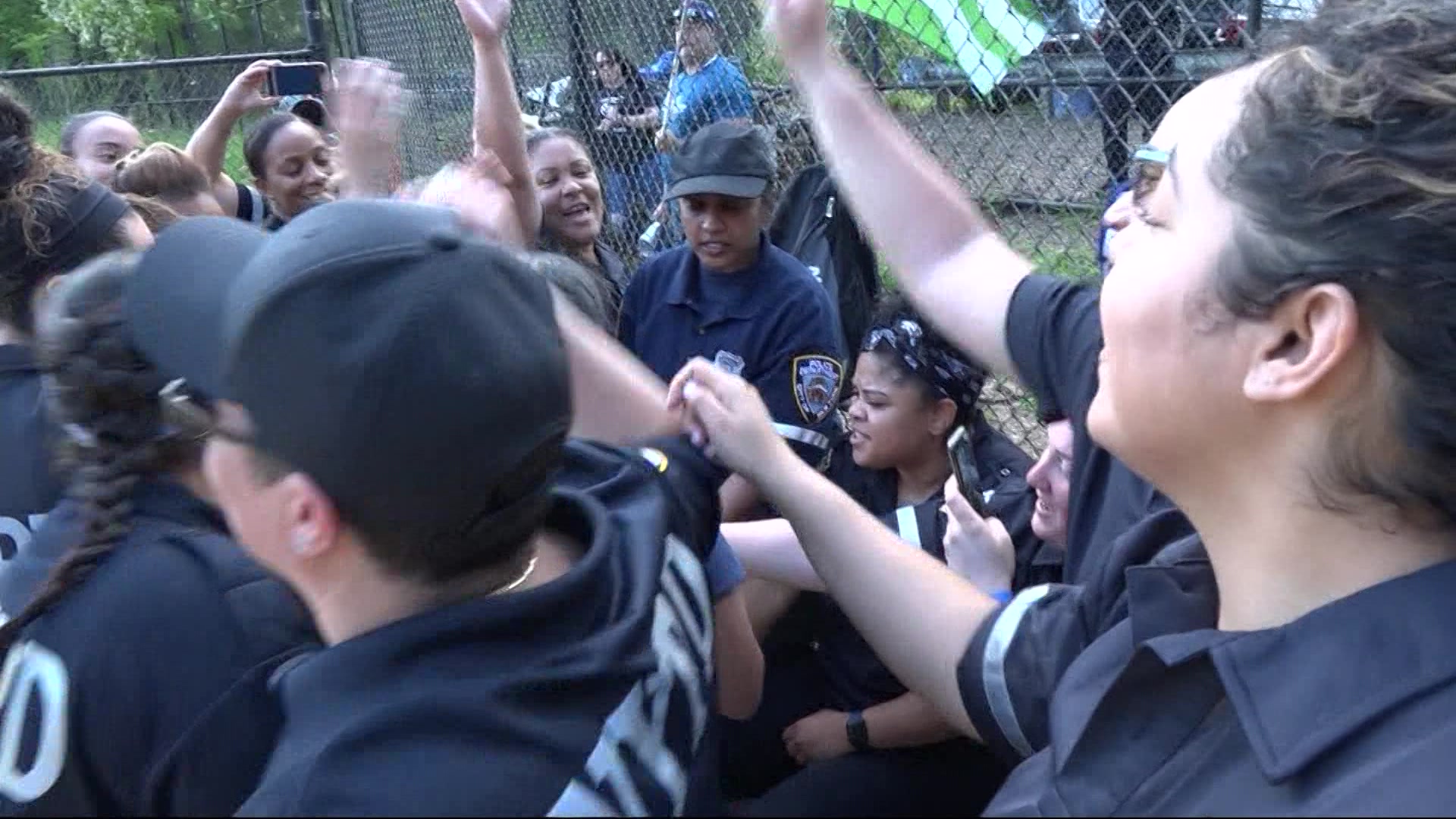 City Divas softball team plays game with female NYPD officers
