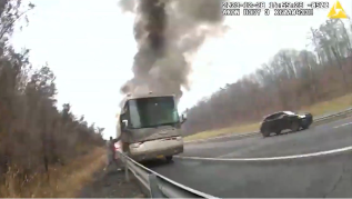 State police bodycam video shows heroic rescue of seniors trapped in ...