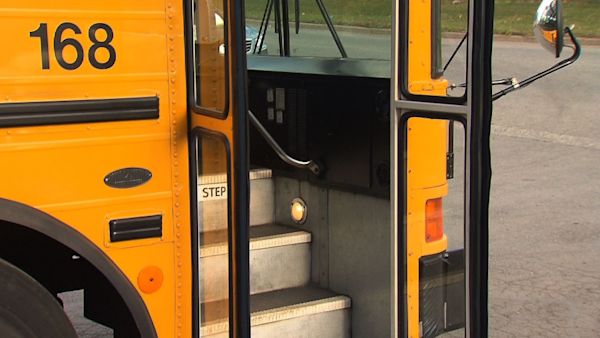 Student injured when school bus, garbage truck collide