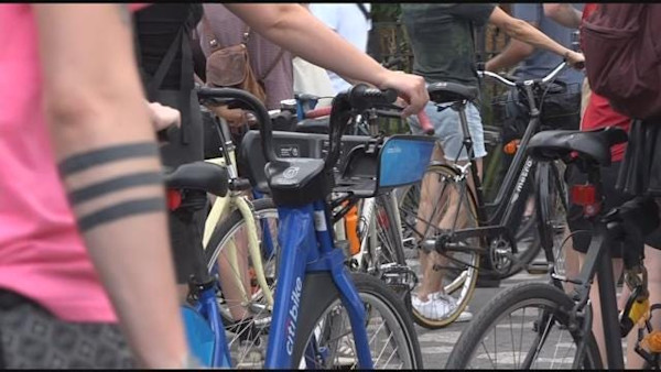 Demonstrators gather for combined Black Lives Matter, Pride bike ride ...