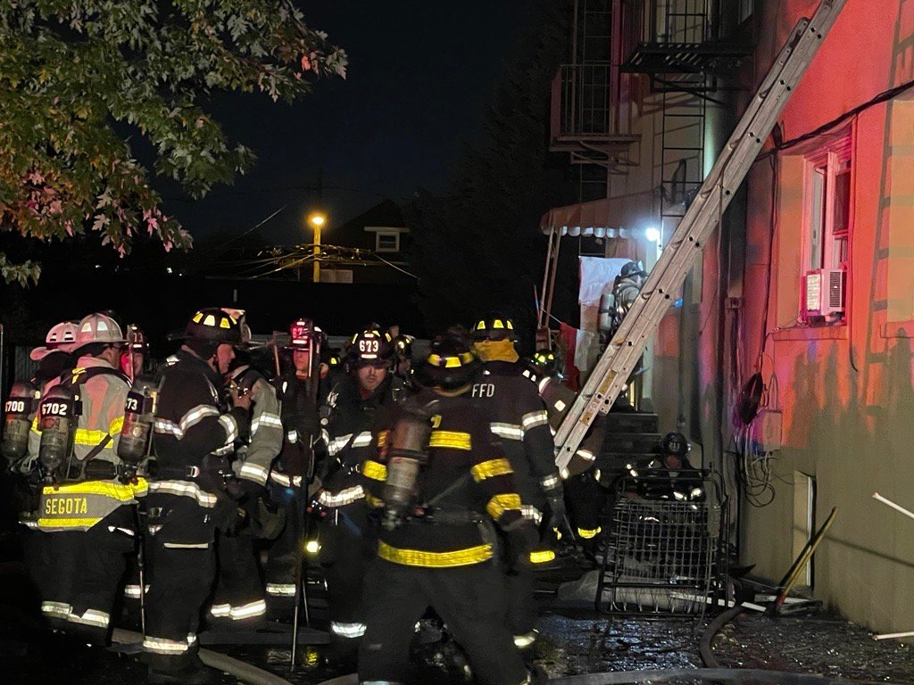 Firefighter trapped in burning building in Freeport, uses axe to escape