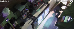 Thief caught on video stealing 2 cash registers from a Lawrence store