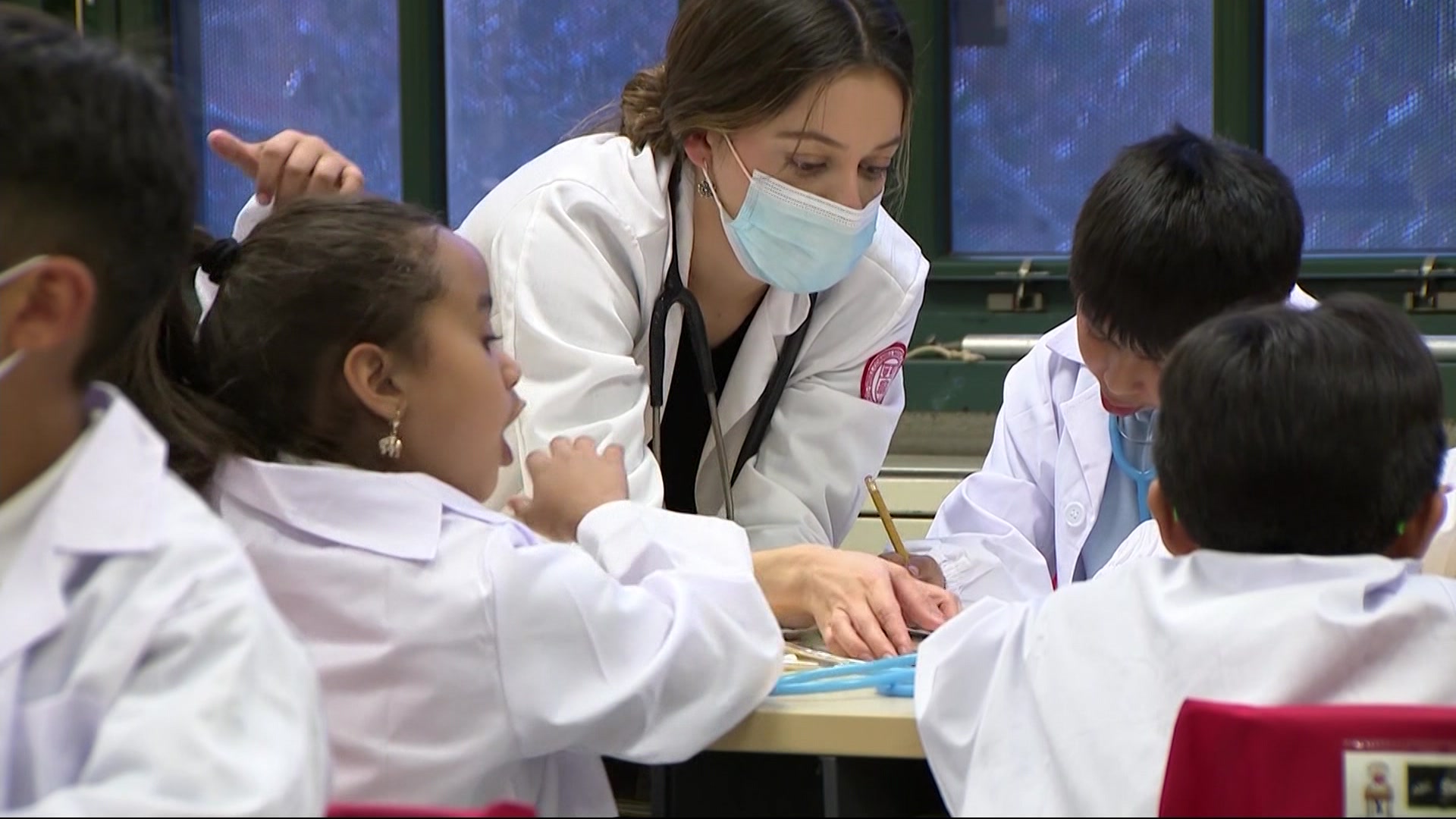 Second graders get to be doctors for a day with medical students