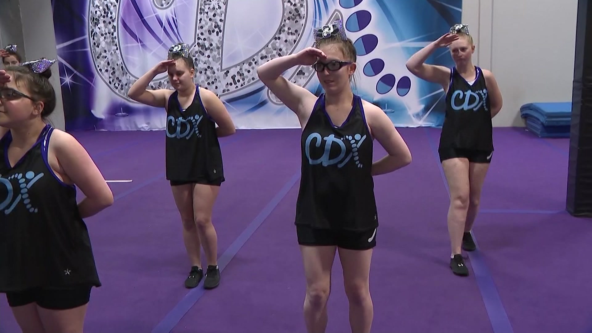 'Everybody is capable of shining.' Cheerleading squad with special ...