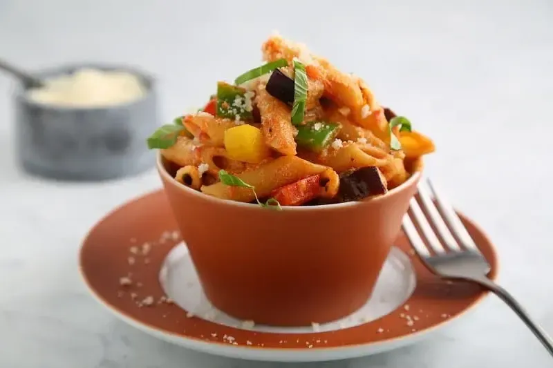 Mostaccioli with Tomato, Multicolor Bell Peppers, Eggplant Sauce and ...