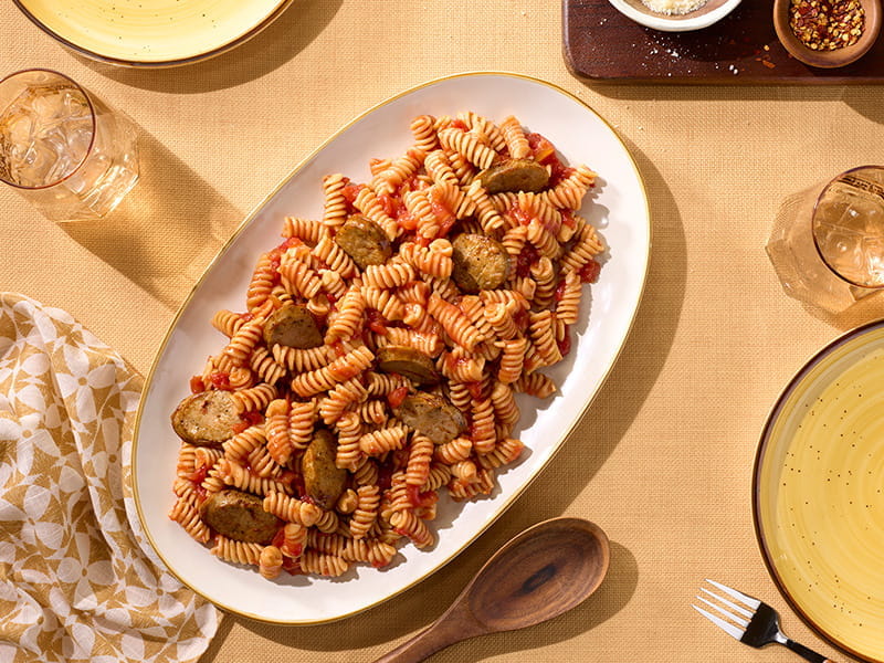 Protein+ Rotini pasta with Spicy Chicken Sausage and Onions Recipe ...