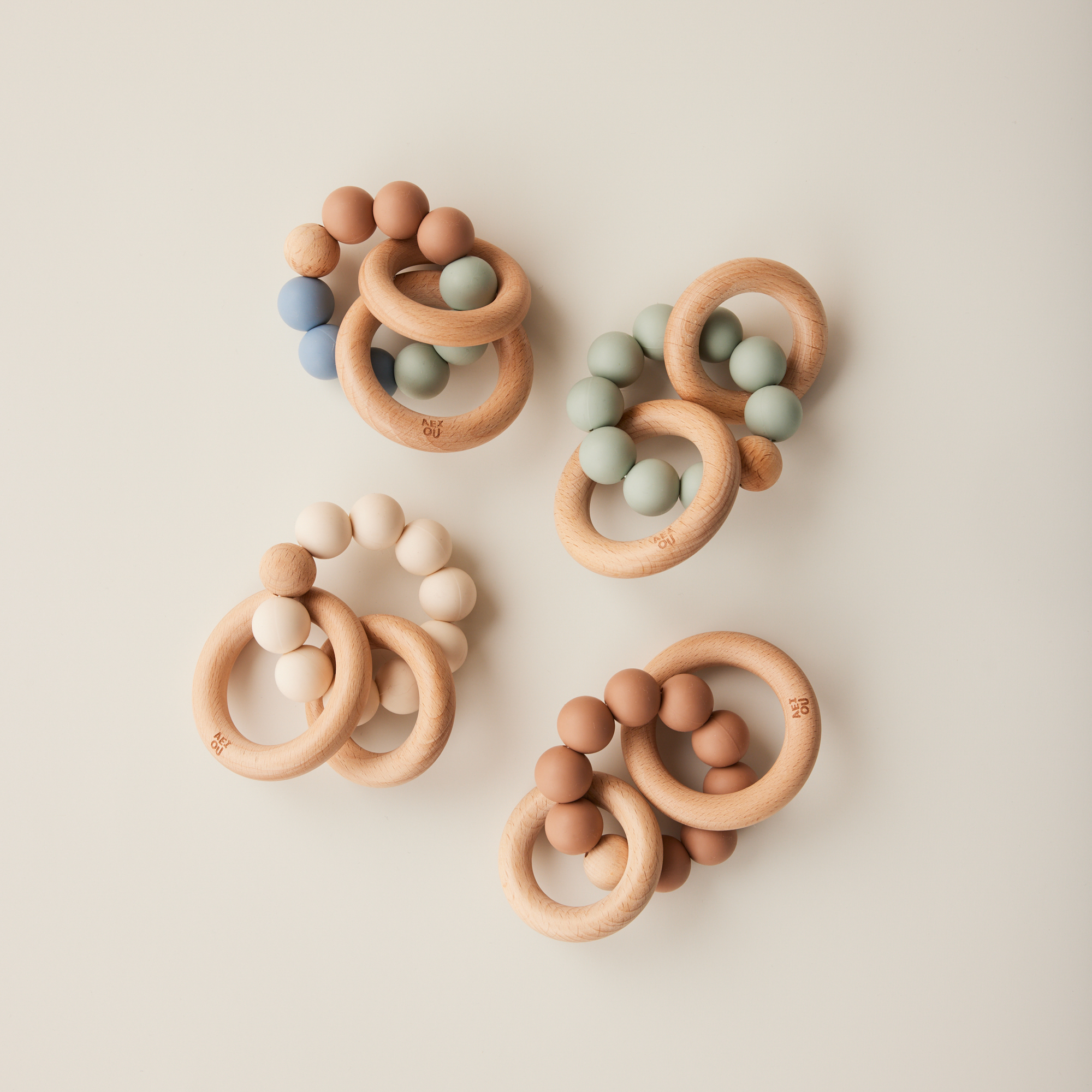 AEIOU Silicone & Wood Multi-Ring Teether - Sage | Babylist Shop