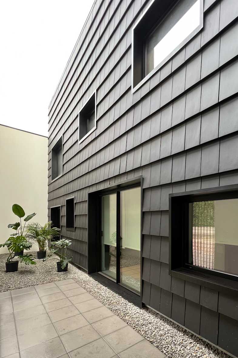 Sistema Tectum® Pro com telha Lógica® Plana em duas moradias no Porto