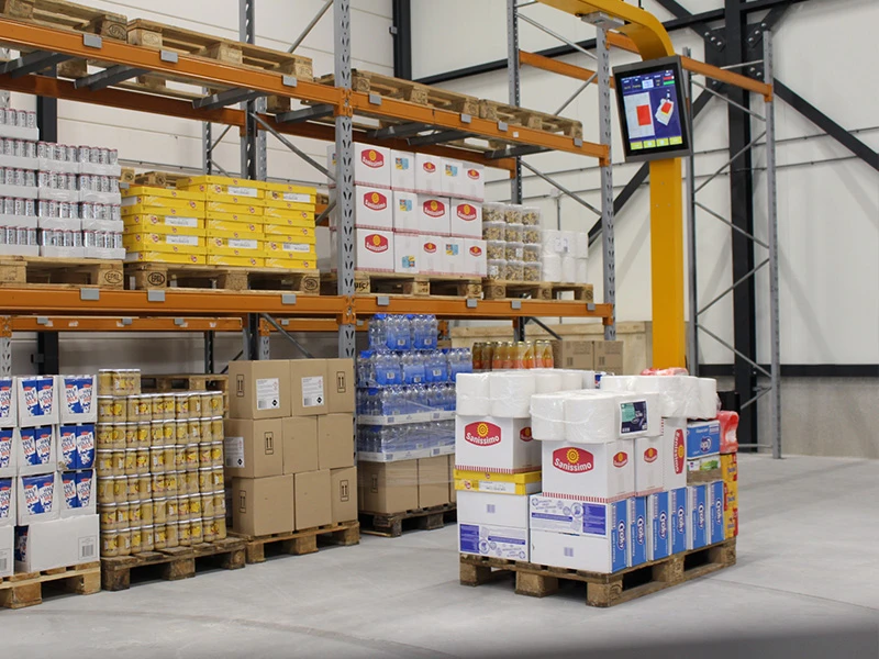 A pallet in a distribution center being loaded. A panel PC is mounted ...