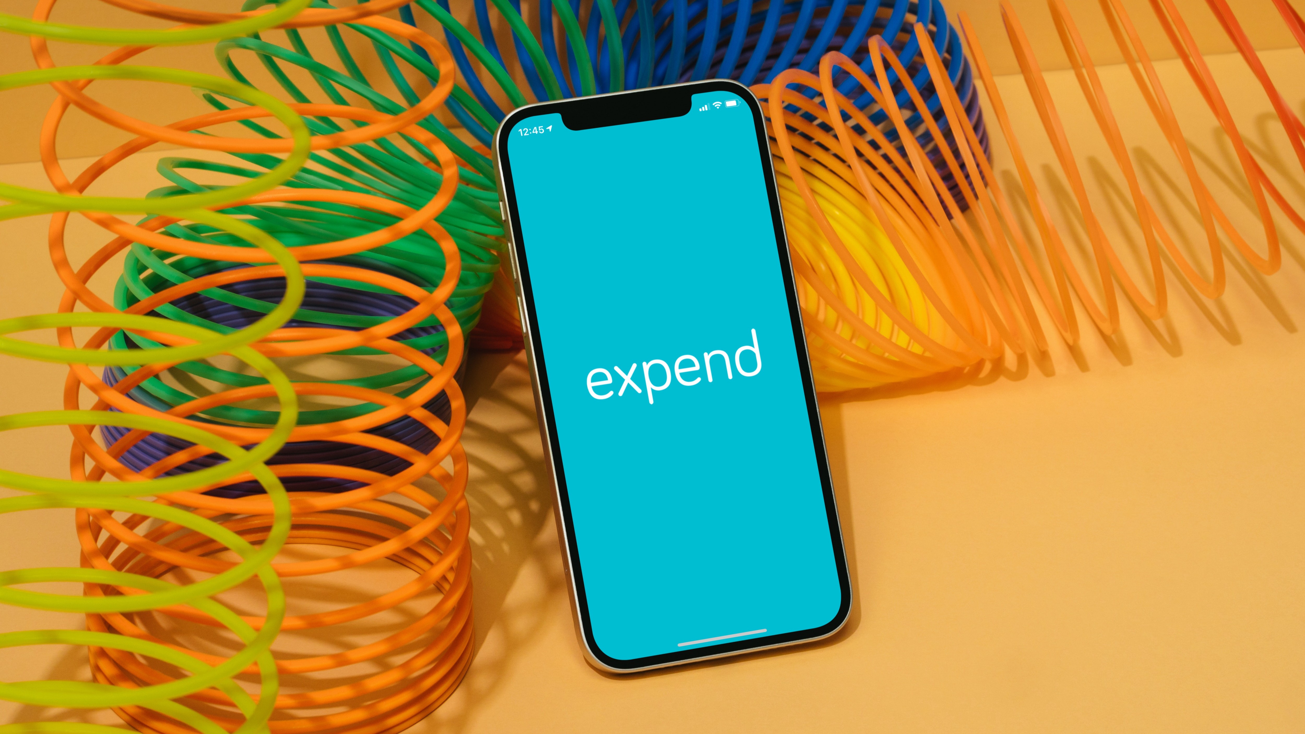 Why are companies adopting expense management apps for their employees?