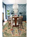 Iris Apfel Birds Of A Feather Green & Peach Rug | Ruggable