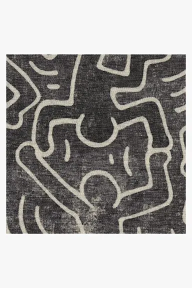 Keith Haring Balancing Act Black Rug | Ruggable