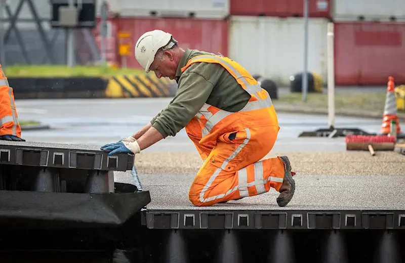 New road made of recycled plastic opens