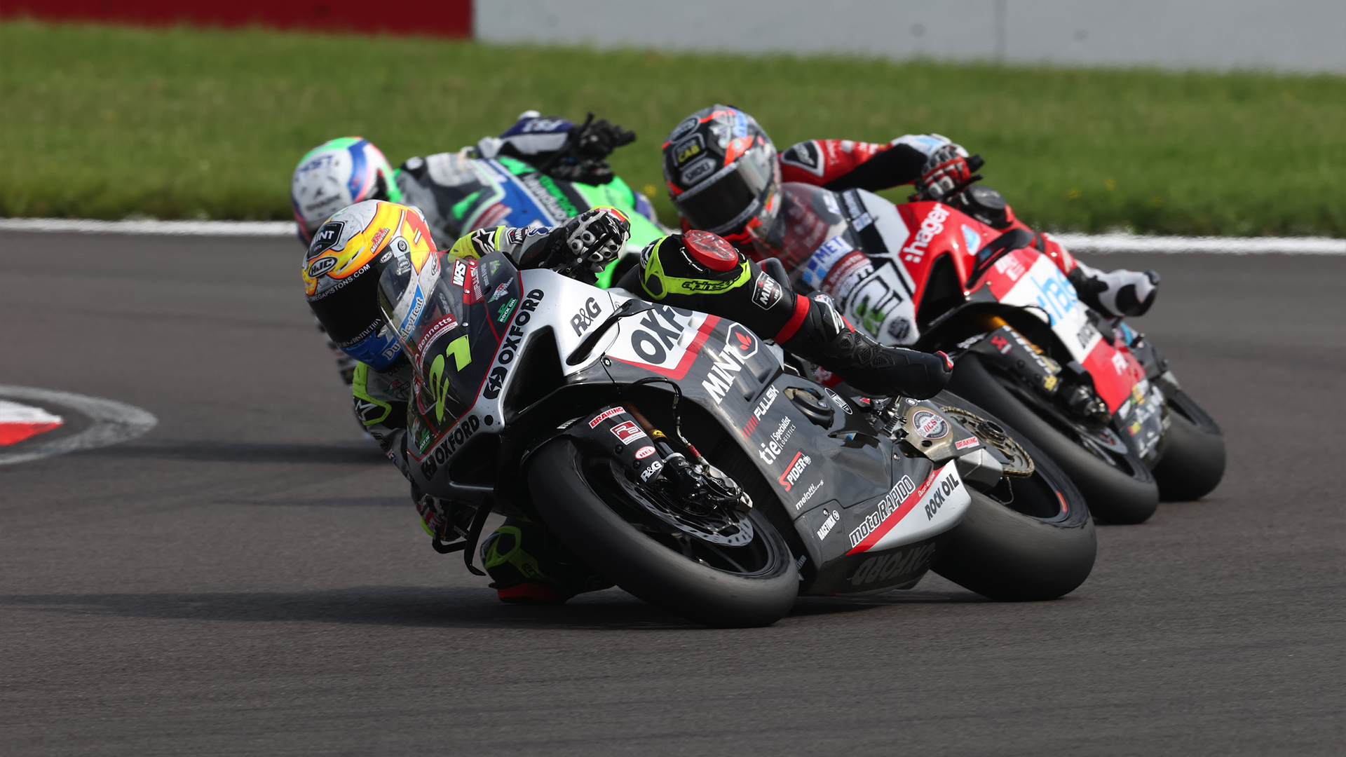 A crash at Donington Park sees Christian Iddon battle through pain ...