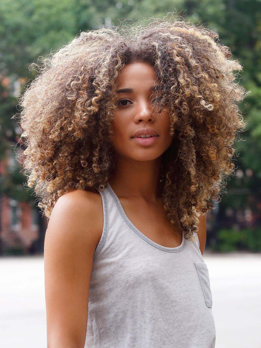How to Grow Your Natural Hair, According to a Pro Hair Stylist