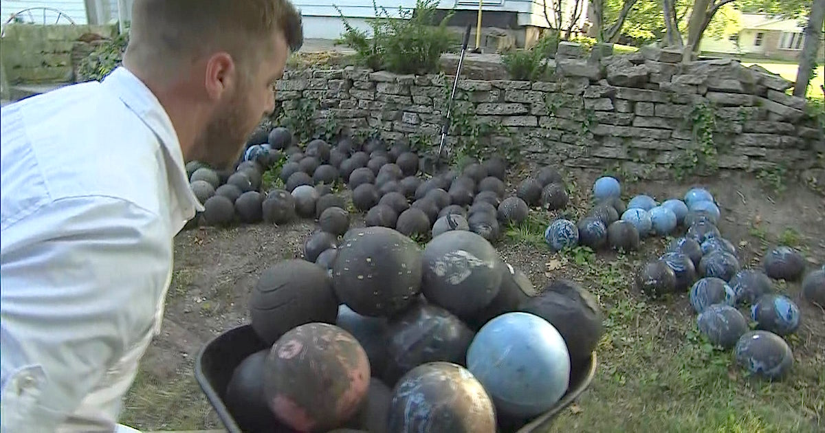 Michigan Dad Finds 160 Old Bowling Balls Buried Under His House ...