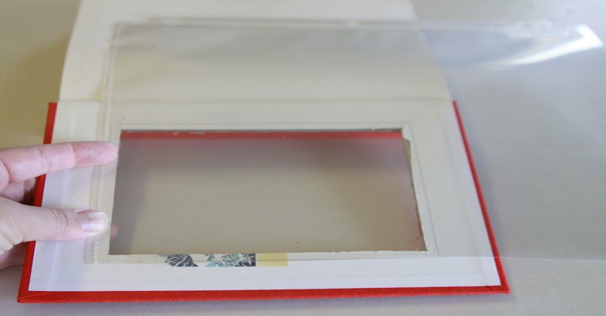 DIY Picture Frame from Old Book - LittleThings | LittleThings.com