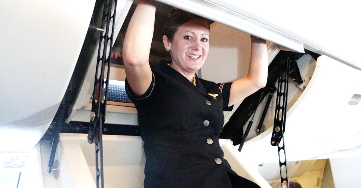 The Flight Attendant Sits In The Overhead Bin, But Wait Til You See ...