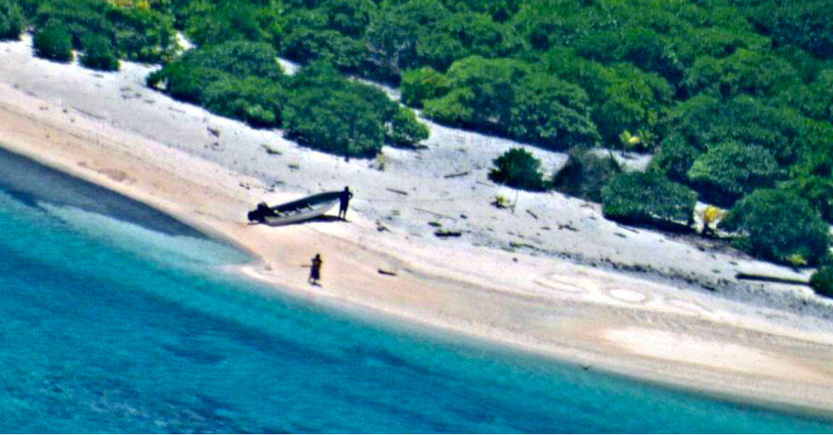 Couple Stranded On Tiny Island Writes Message In The Sand, Finally Gets ...