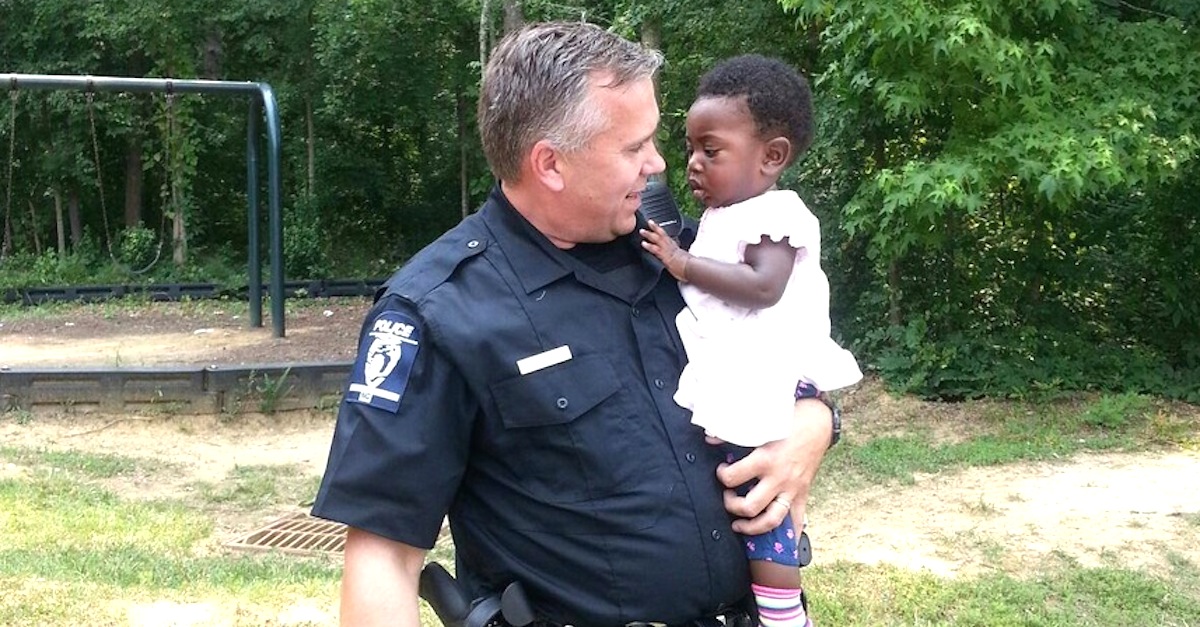 Local Cop Was Seen Holding This Baby Girl... When I Saw Why, No Wonder ...