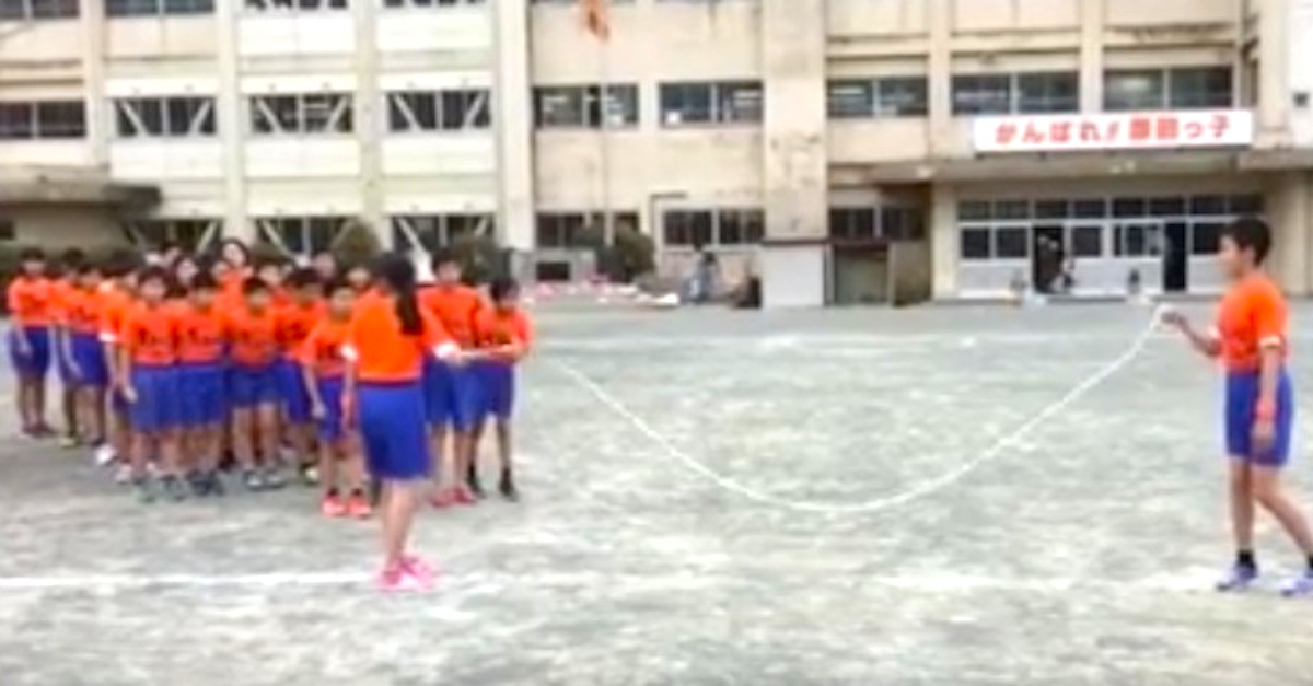 Students Line Up In Rows Behind A Rope. But When They Start Jumping, My ...