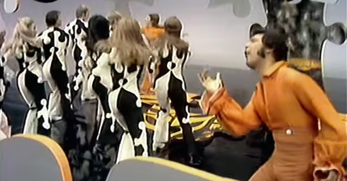 Tom Jones Dons A Tight Orange Jumpsuit To Cover This Famous Beatles ...