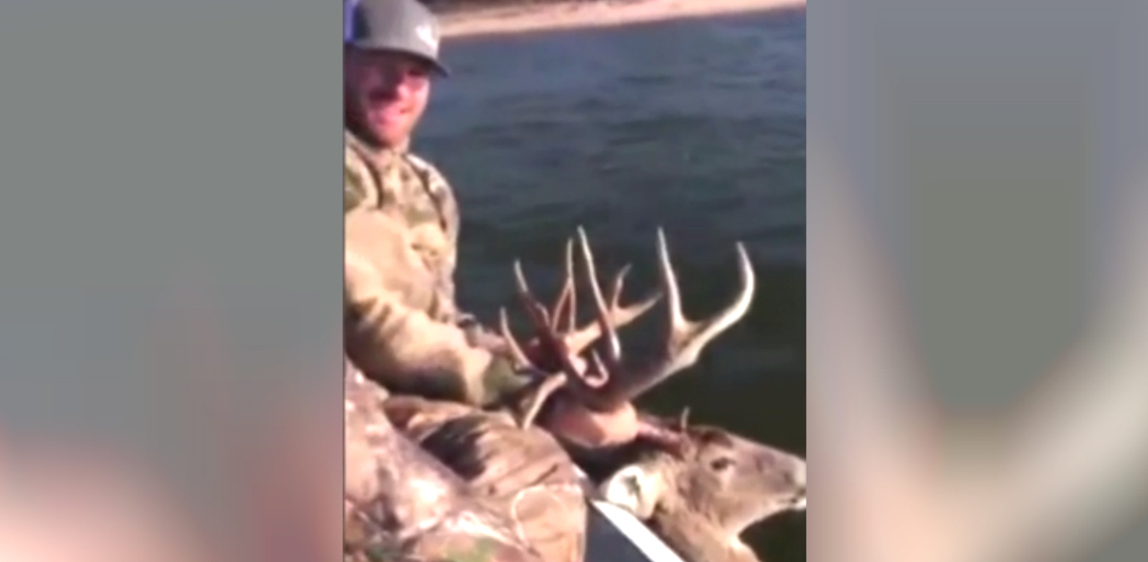 Hunter Drags Drowning Deer Through Water To Save Him | LittleThings.com