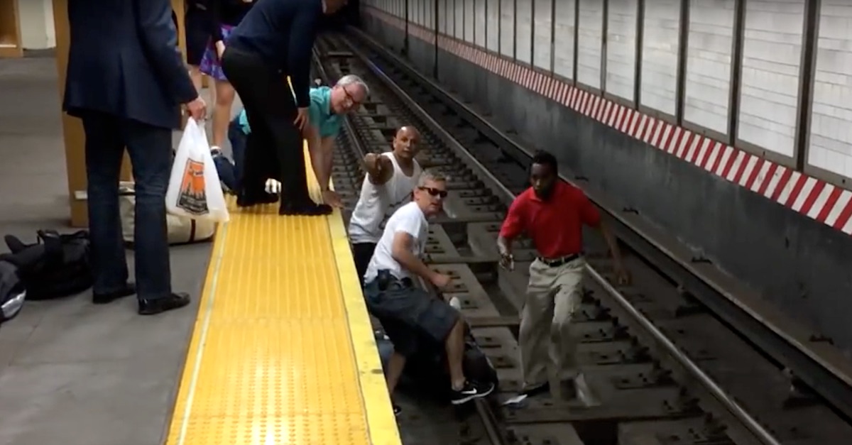 Man In Red Starts Running On Train Tracks. But Look Closely At What’s ...