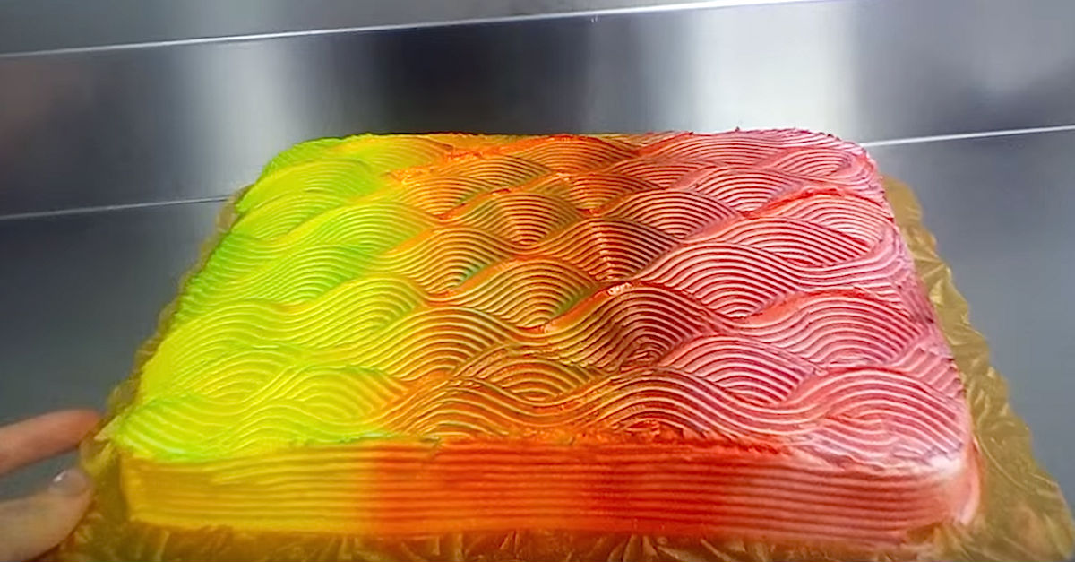 It Looks Like A Normal Cake, But Watch The Icing As She Spins It...WHOA ...