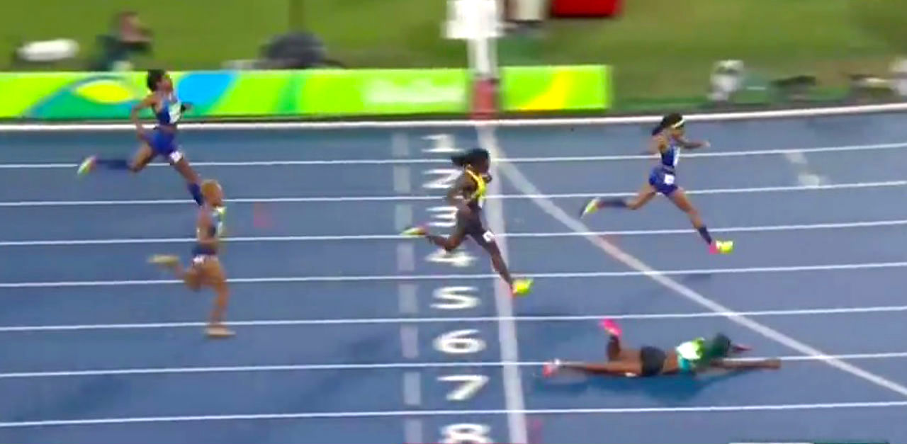 Bahamas Sprinter Dives Over The Finish Line At The Last Second For The ...