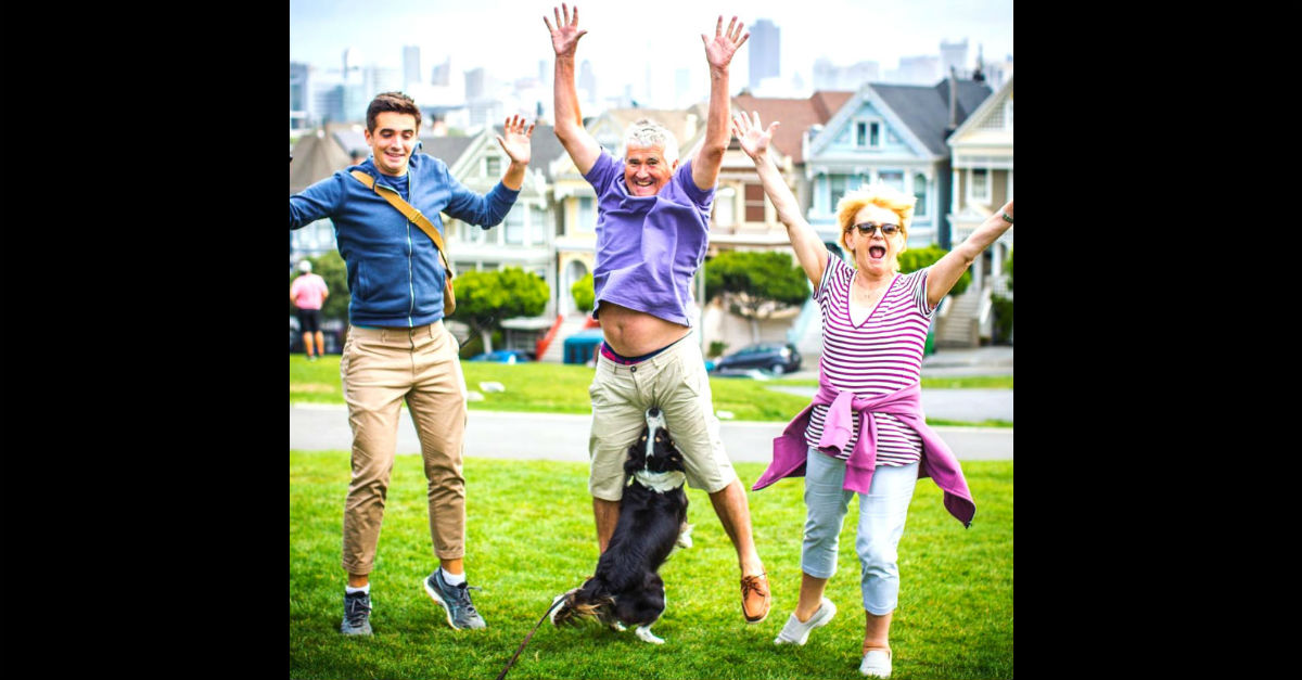 Family Photo Goes Wrong When Dog Bites Dad’s Shorts | LittleThings.com