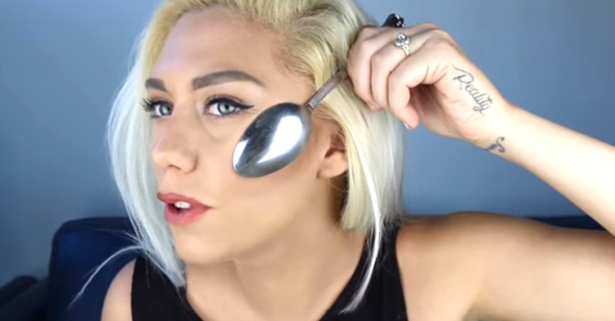 She Holds A Spoon To The Apple Of Her Cheek. When She Pulls It Away ...