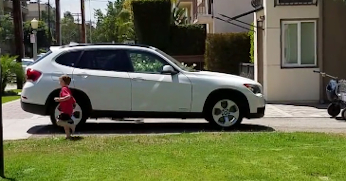 Little Boy Runs Around His Car. Now Watch Who Comes After Him On The ...