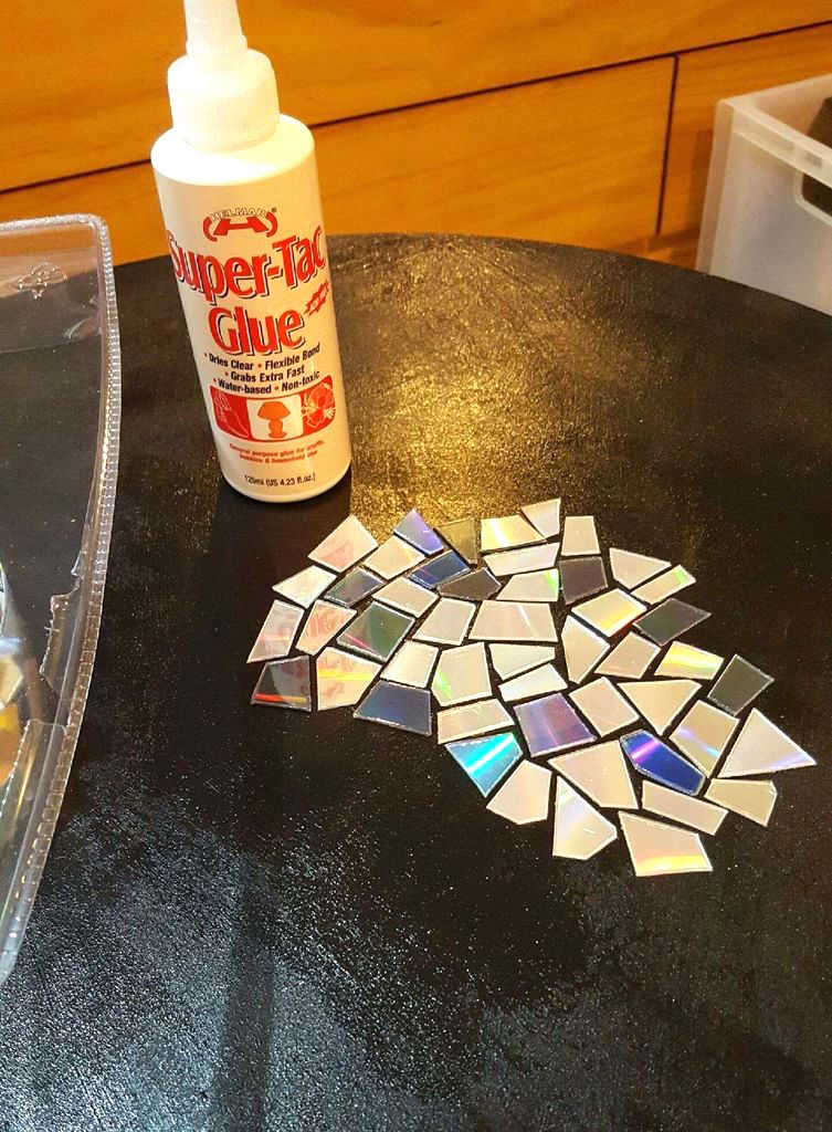 He Cuts His Old CD Collection Into Pieces. Then He Grabs The Glue ...