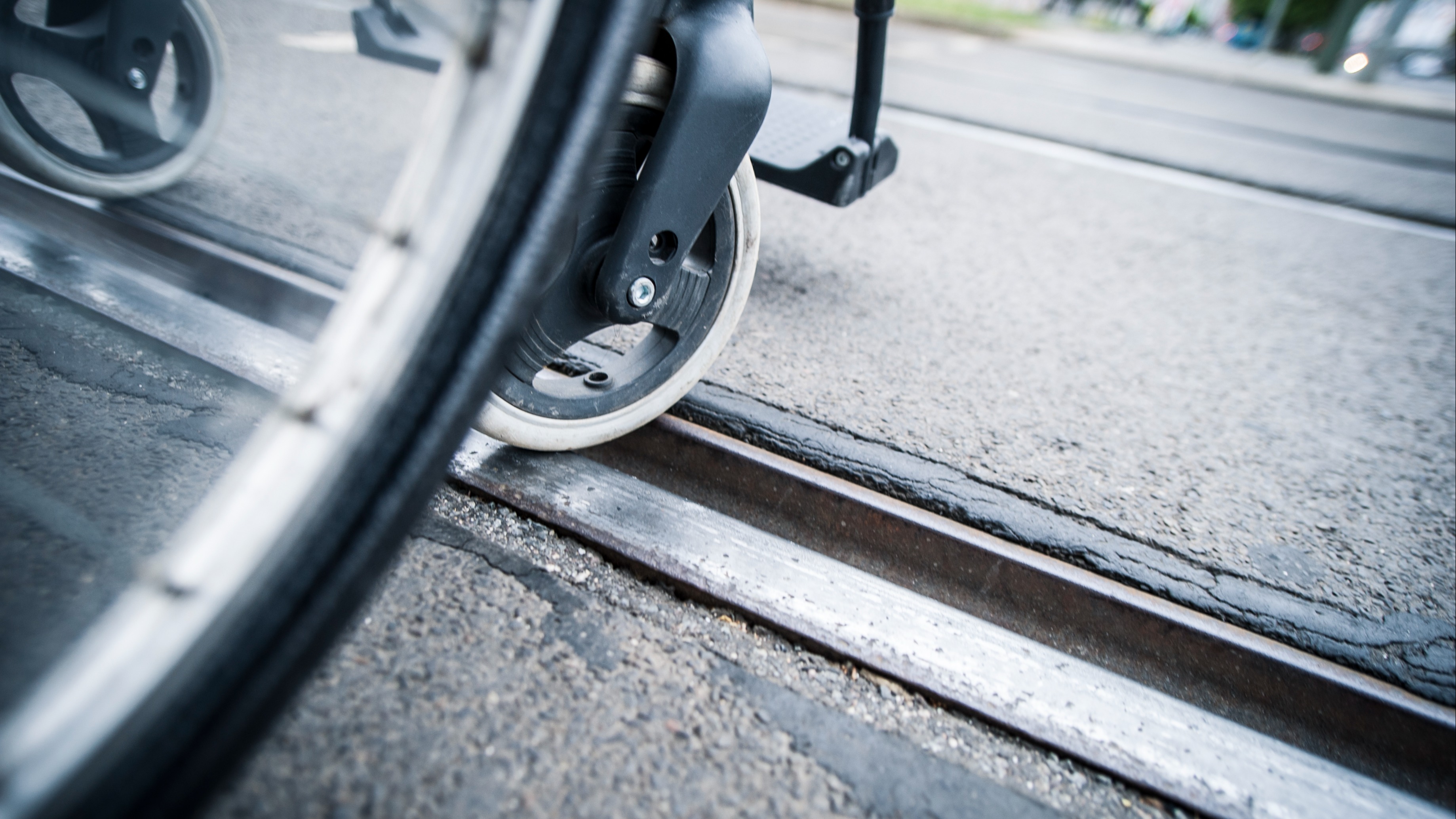 Man In Wheelchair Gets Stuck On Railway Tracks & Cop Does Impossible To ...