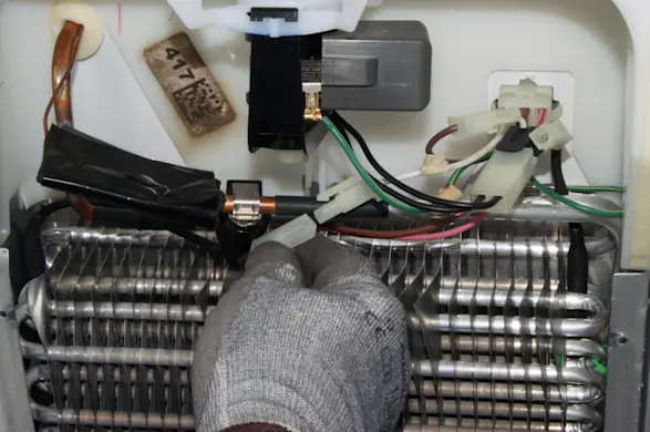 How to replace a defrost heater in a side-by-side refrigerator | Repair ...