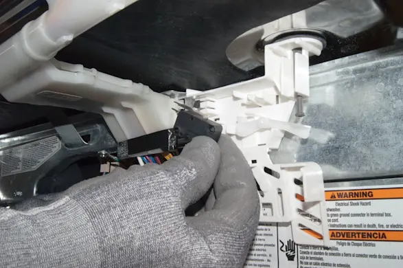 How to replace a dishwasher overfill float switch | Repair guide