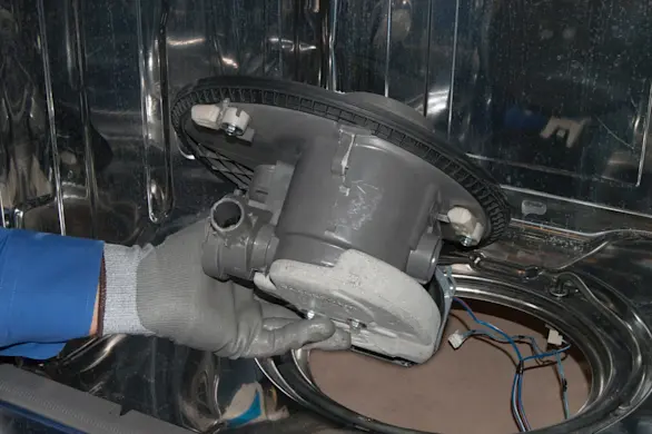 How to replace a dishwasher circulation pump and motor assembly ...